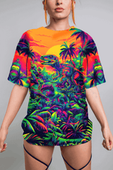 Woman wearing vibrant dinosaur-themed rave shirt by Freedom Rave Wear.